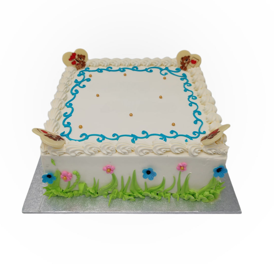 Grass with Flower Square cake – Cakeforestlondon
